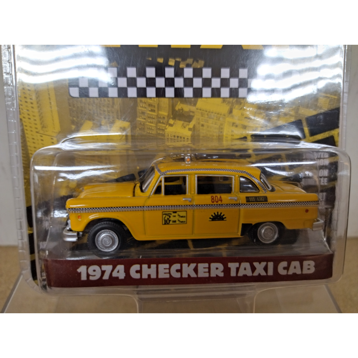 CHECKER 1974 TAXI CAB HOLLYWOOD 1:64 GREENLIGHT - BCN STOCK CARS