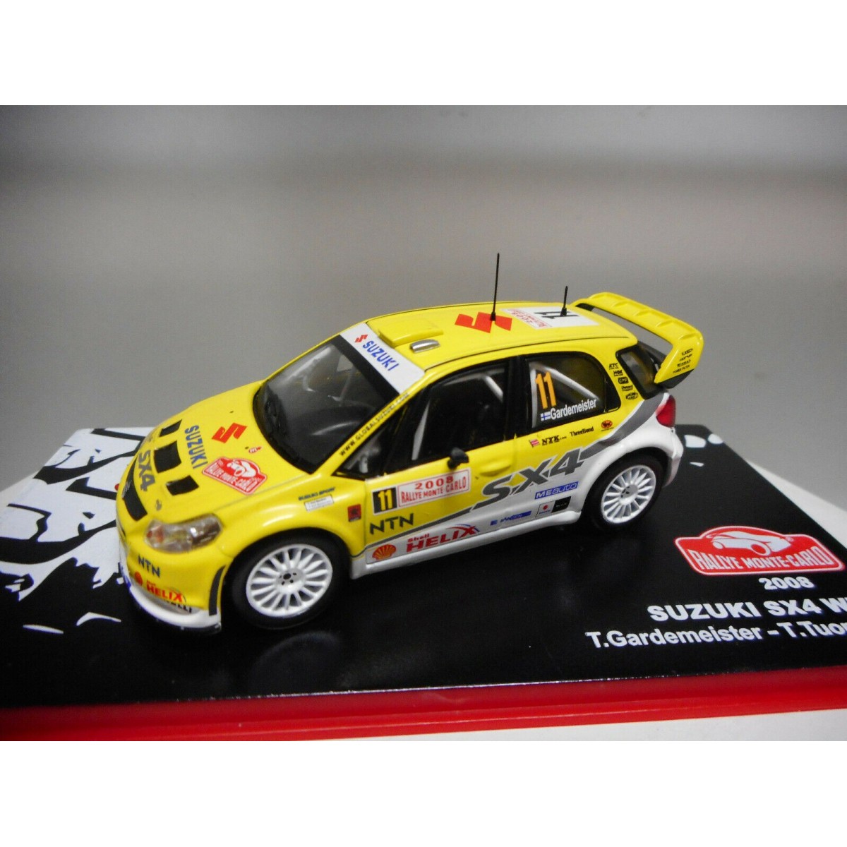 SUZUKI SX4 WRC RALLY MONTE CARLO 2008 T.GARDEMEISTER ALTAYA IXO 1:43 - BCN STOCK CARS