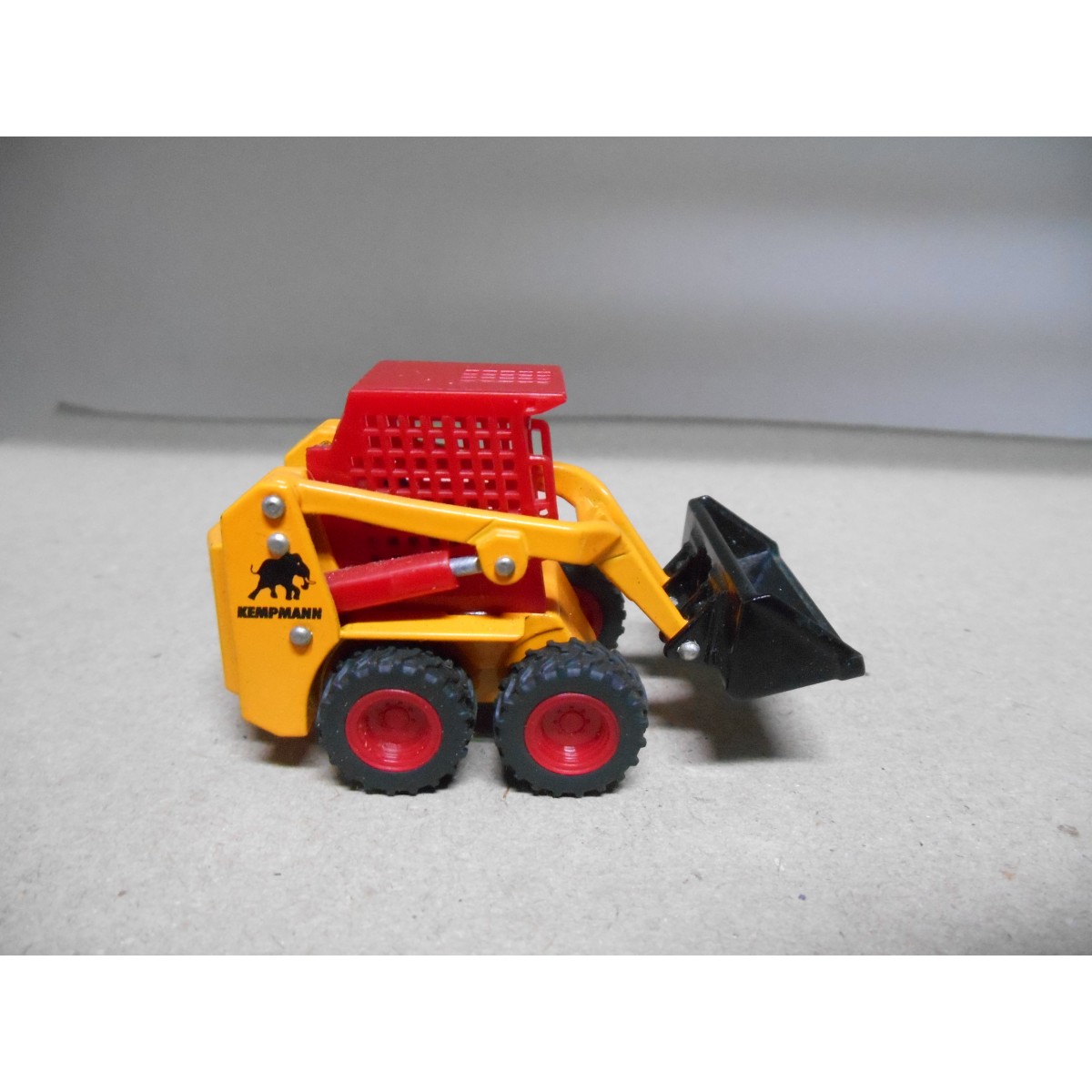 SKID STEER LOADER/CARGADORA BOBCAT KEMPMANN 1:50 APX USADO/NO CAJA SIKU ...
