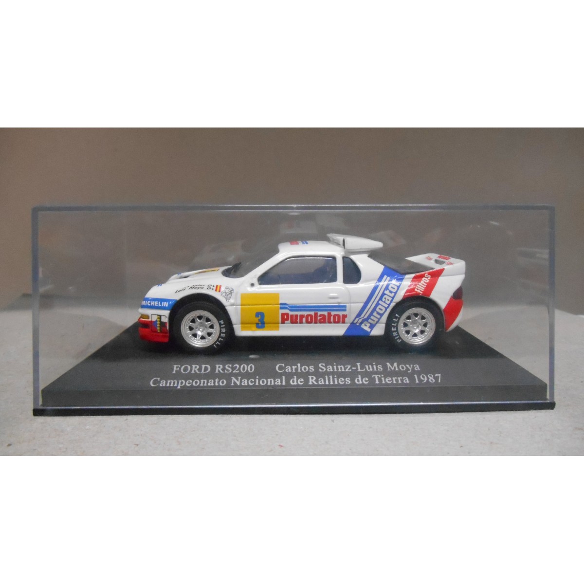 FORD RS 200 RALLY TIERRA 1987 C.SAINZ 1:43 ALTAYA IXO DEFECTO/NO RETROS ...